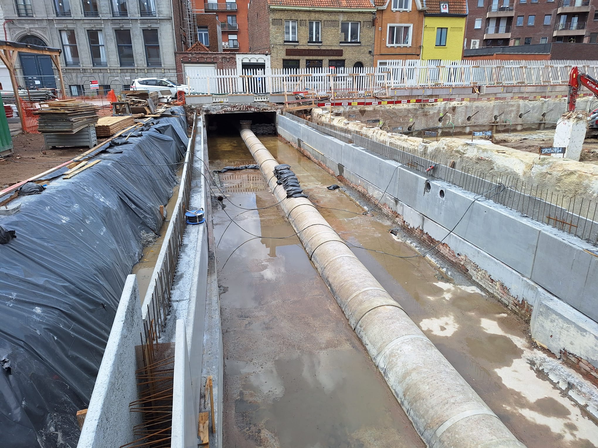 Overdekking van de mandelbeek